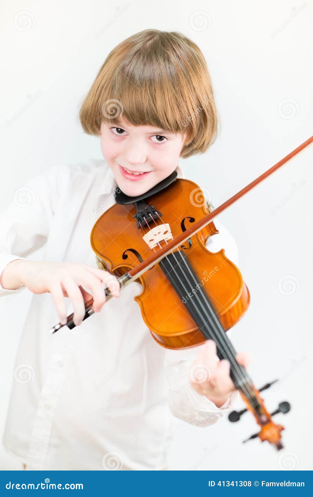 Happy child playing violin stock photo. Image of child - 41341308