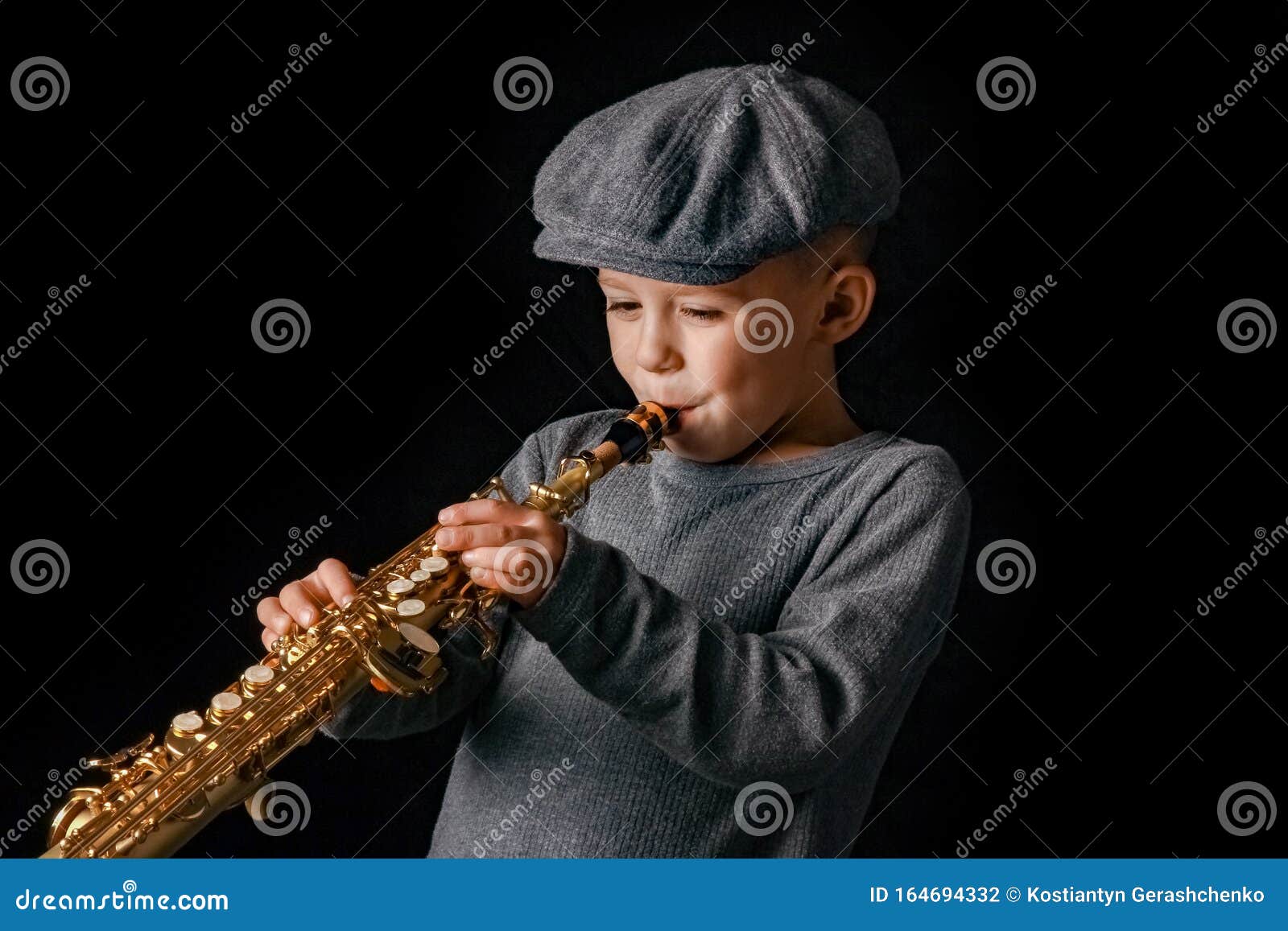 Happy Child Plays Saxophone in Studio Stock Photo - Image of cute ...