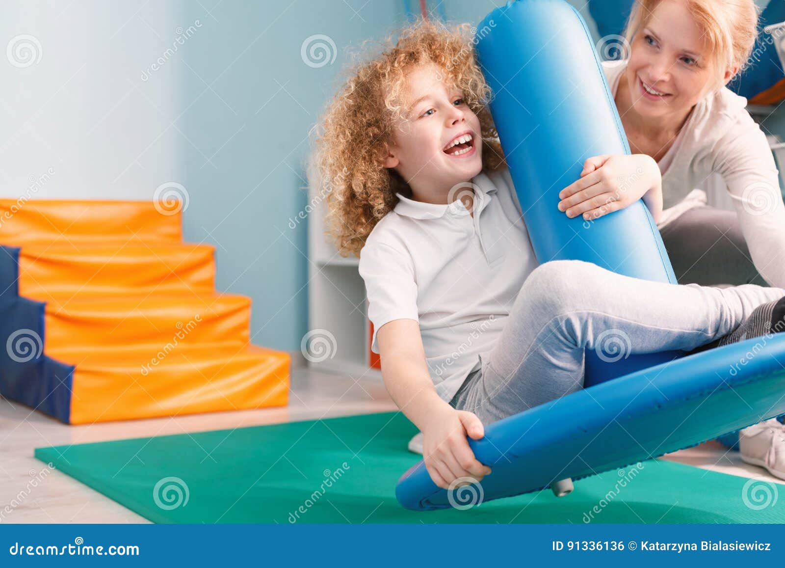 Happy Child and Professional Therapist Stock Photo - Image of room ...