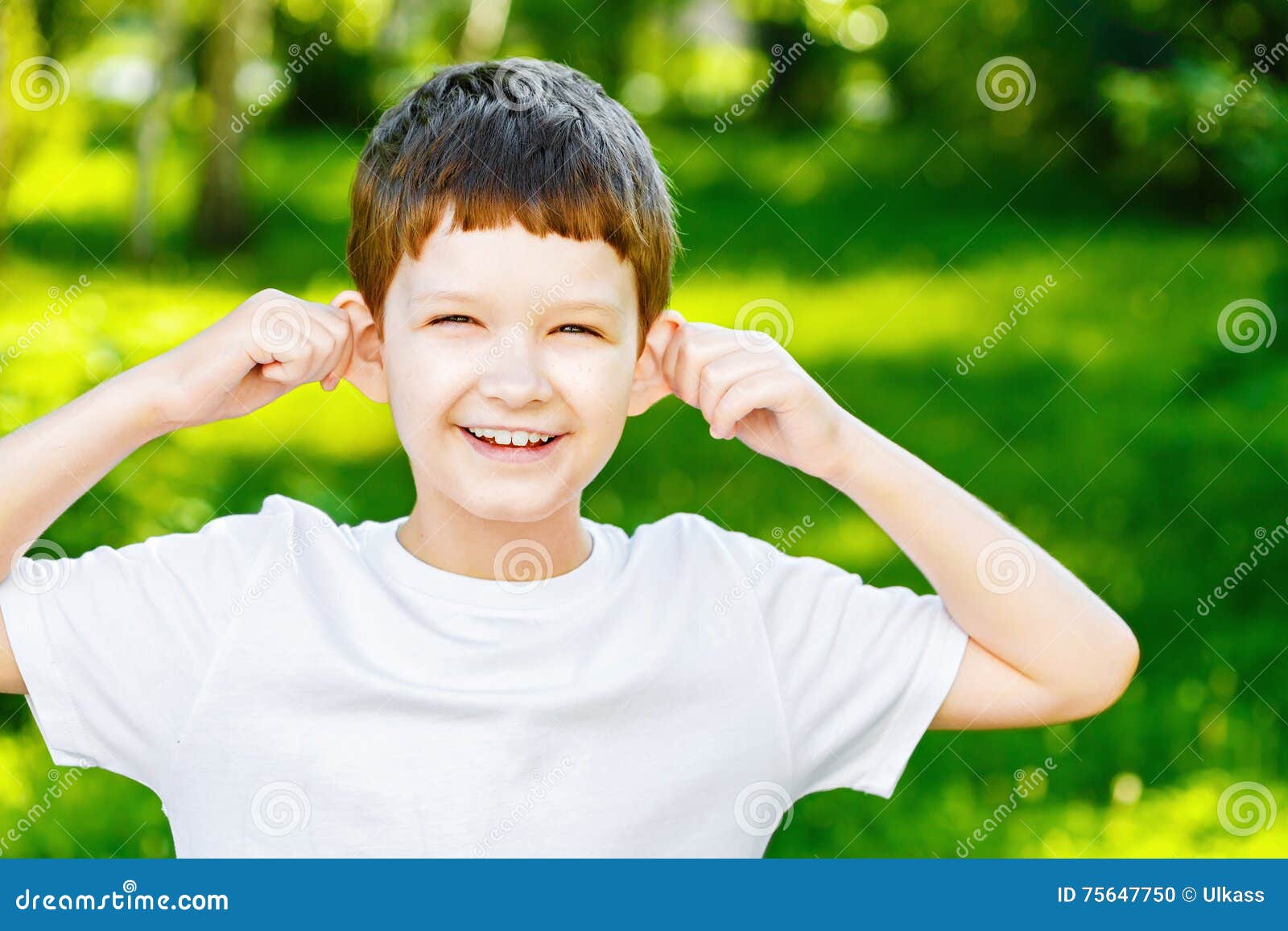 Happy Child, Pulling Himself on the Ears Stock Photo - Image of cupped ...