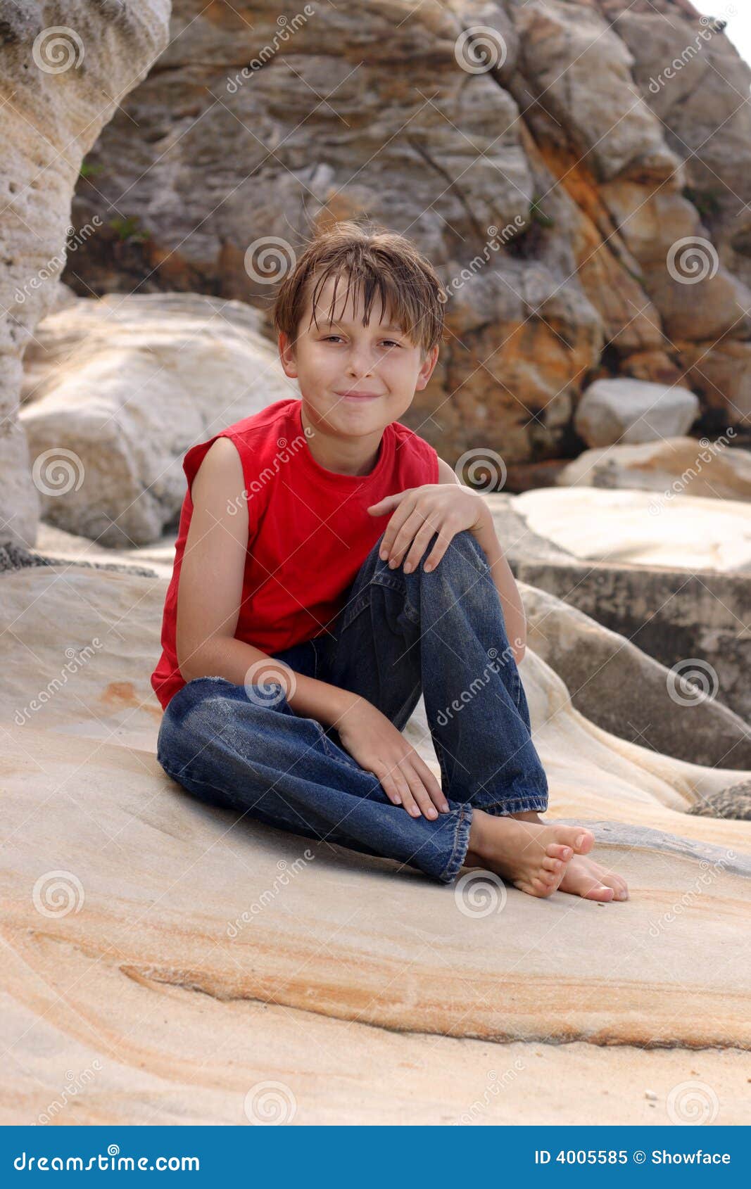 Happy Child Relaxes on Rocks Stock Image - Image of resting, lifestyle ...