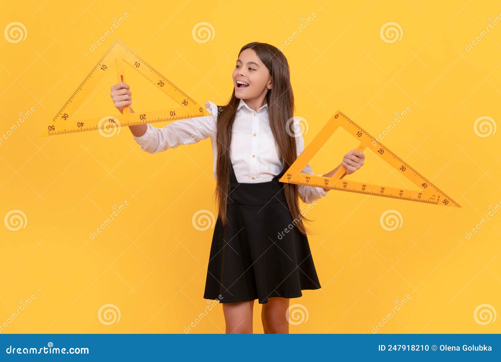 Happy Child in School Uniform Hold Mathematics Triangle for Measuring ...