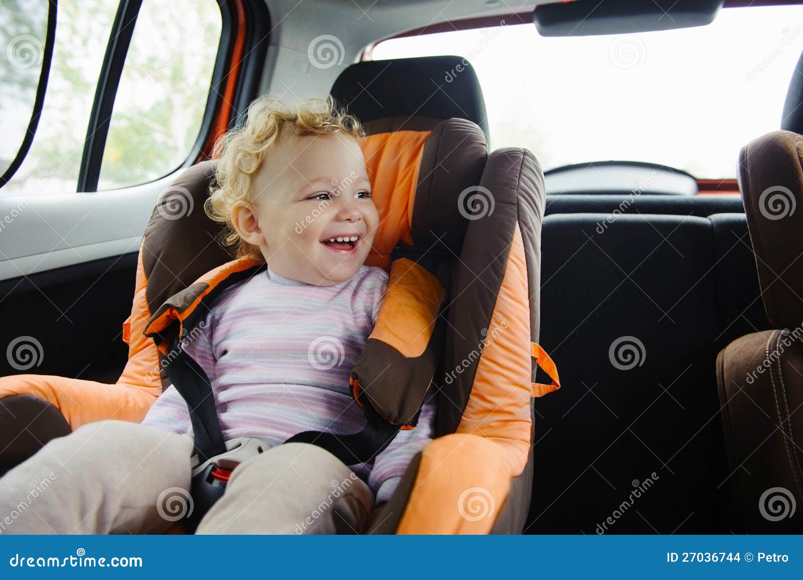 Happy Child Smiling in Car Seat Stock Photo - Image of life, emotion ...