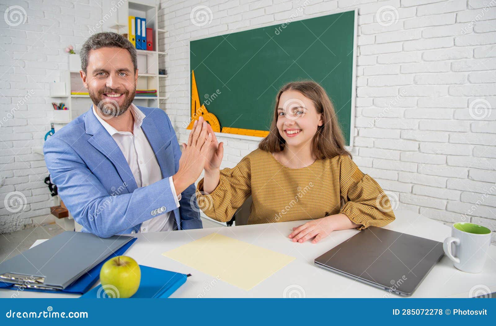 Happy Child Study in Classroom with Tutor. Take Five Stock Photo ...