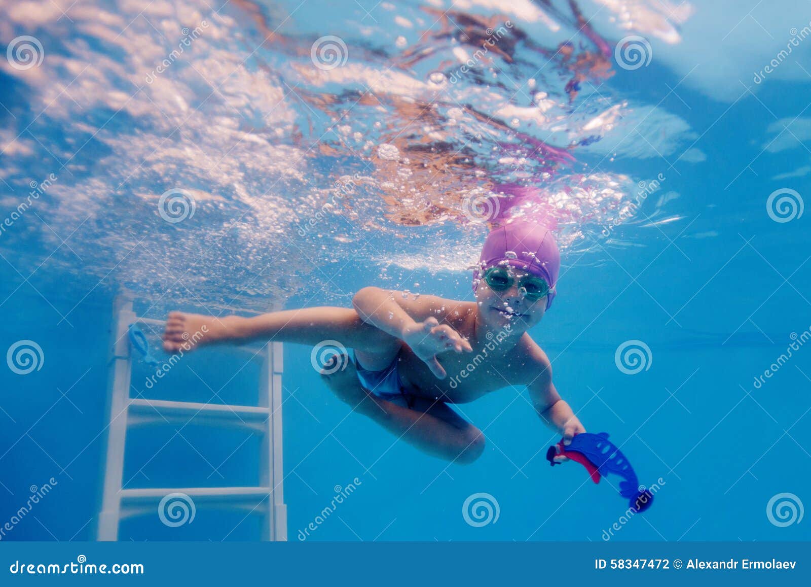 Happy Child is Trained To Dive in the Pool Stock Photo - Image of ...