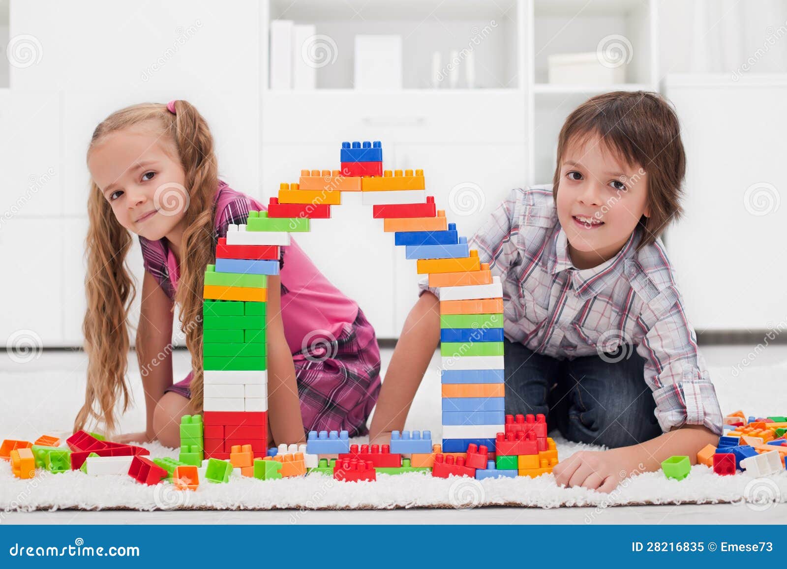 Happy children with blocks stock image. Image of child - 28216835
