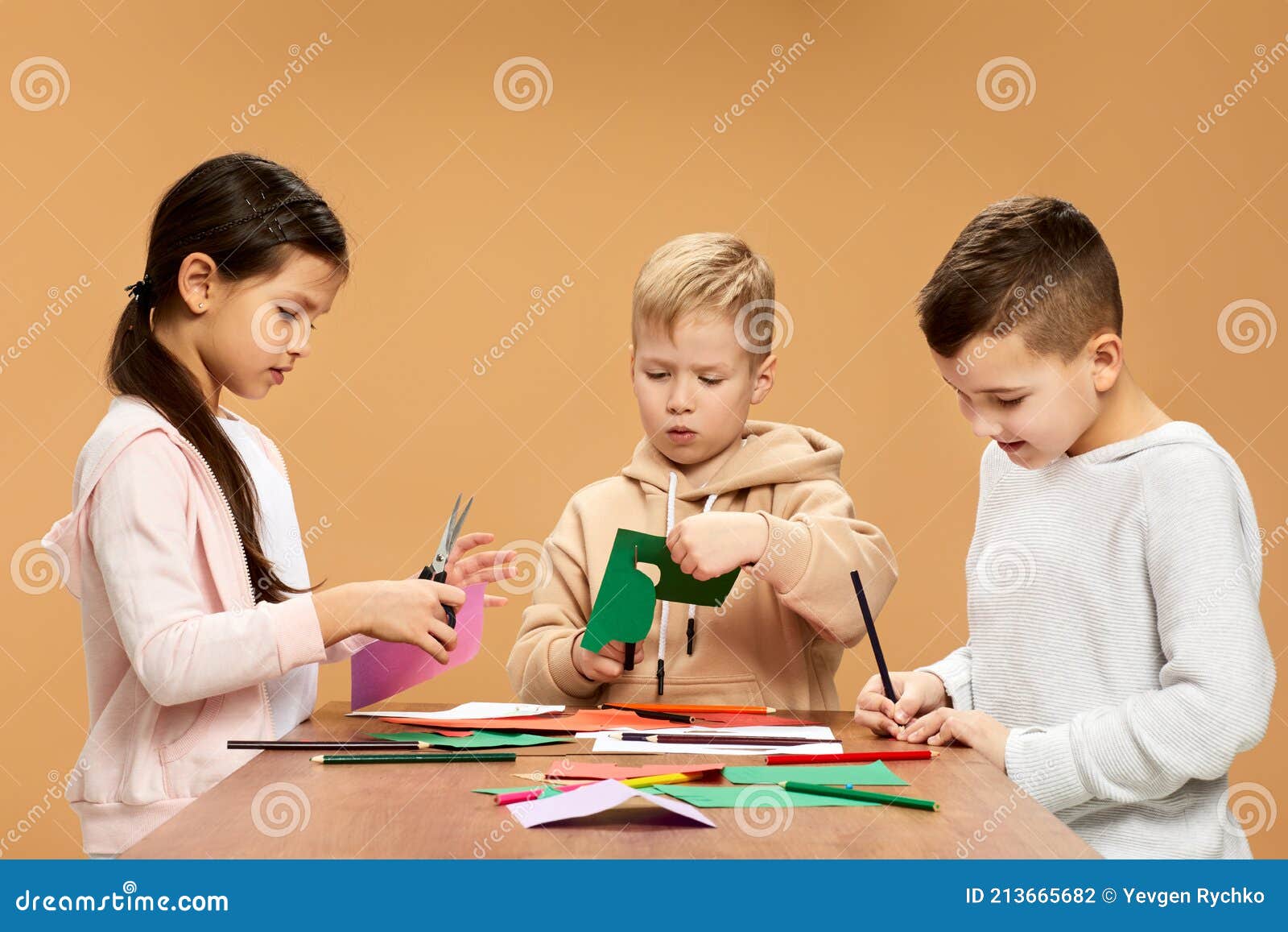 Happy Children Cutting Colored Papers with Scissors Stock Photo - Image ...