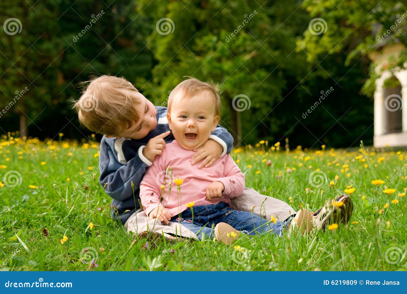 Happy children in field stock image. Image of adorable - 6219809