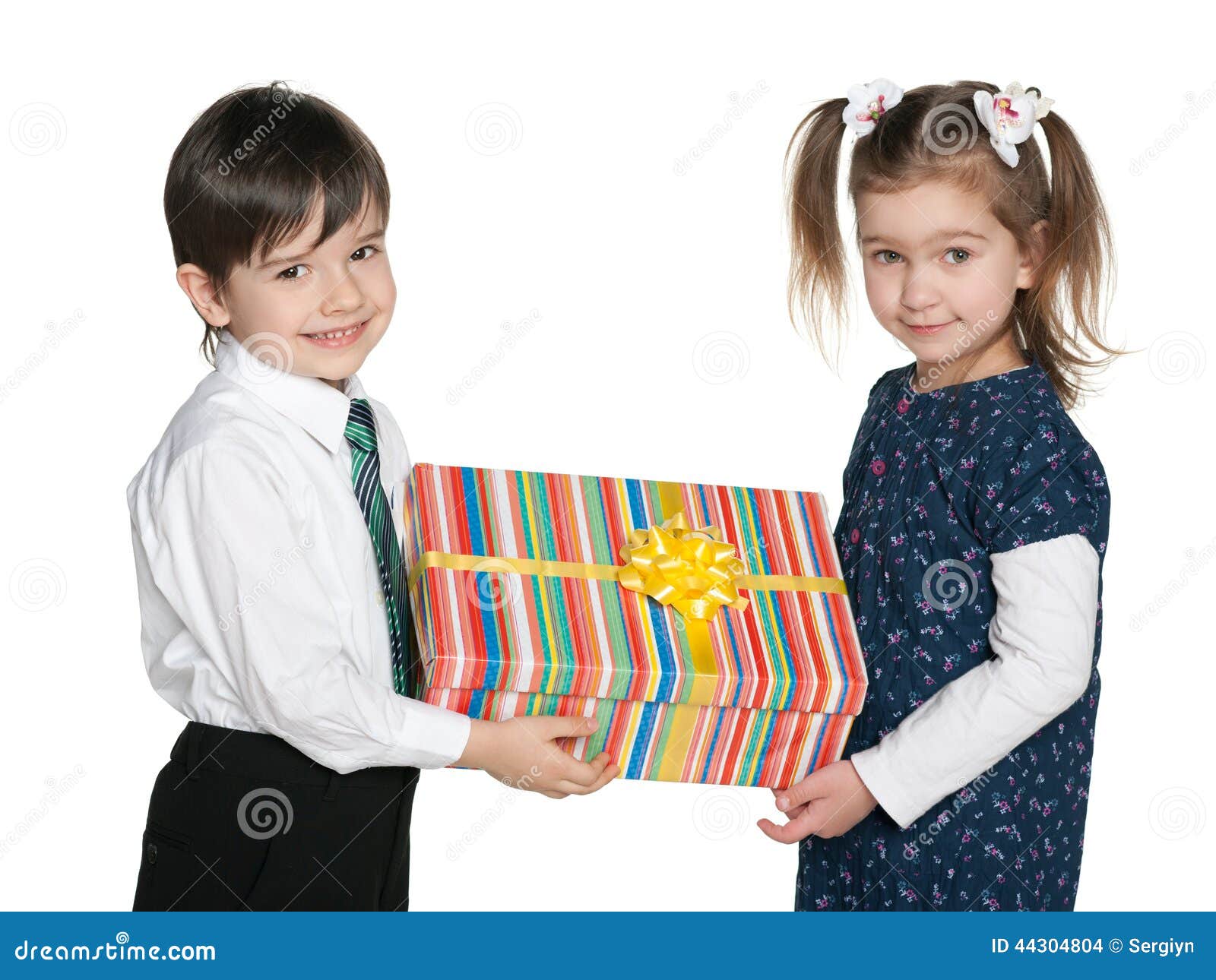 Happy Children Hold A Gift Box Stock Photo | CartoonDealer.com #44304804