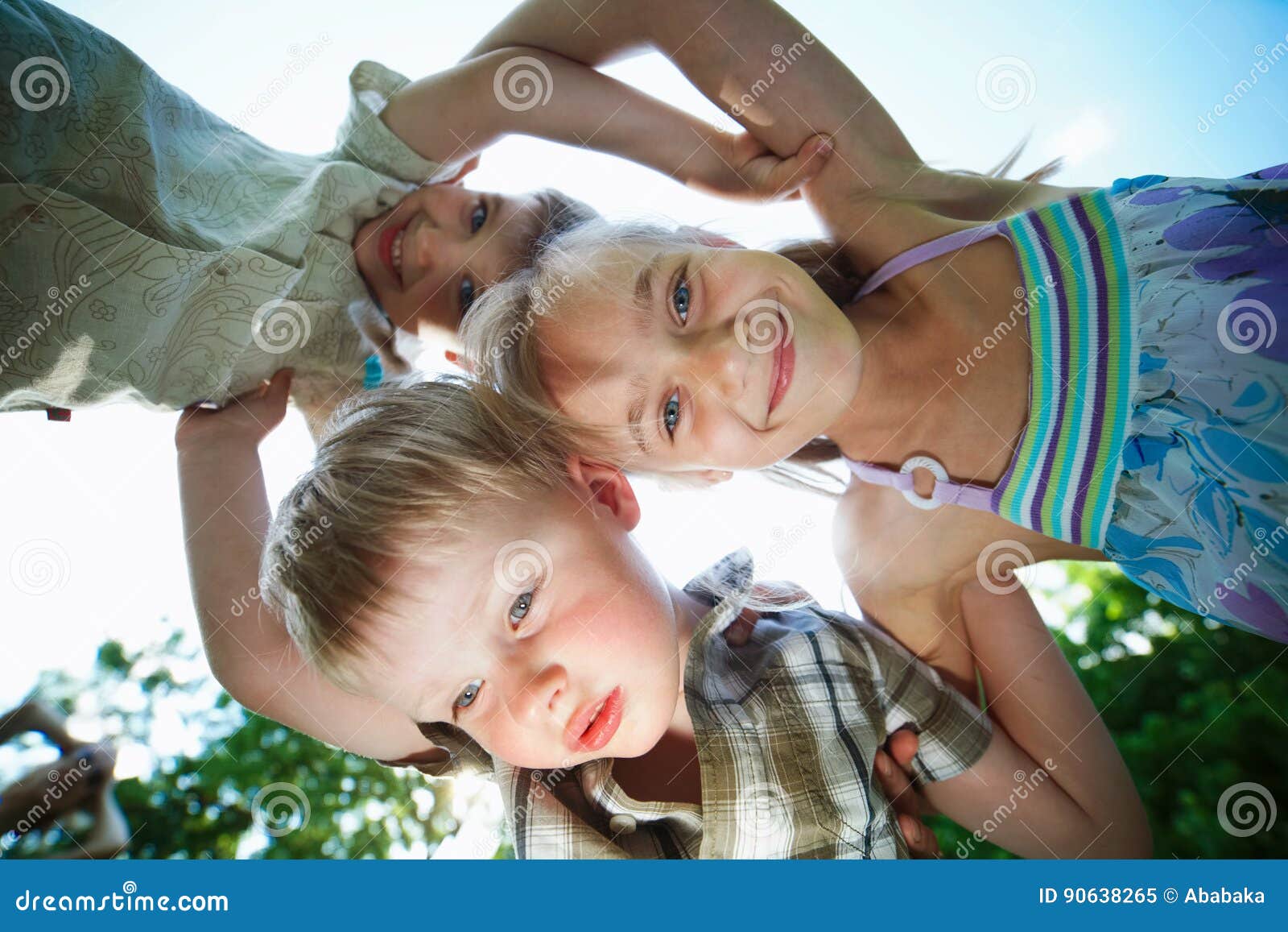 Happy Children Hugging Bottom View Stock Image - Image of positive ...