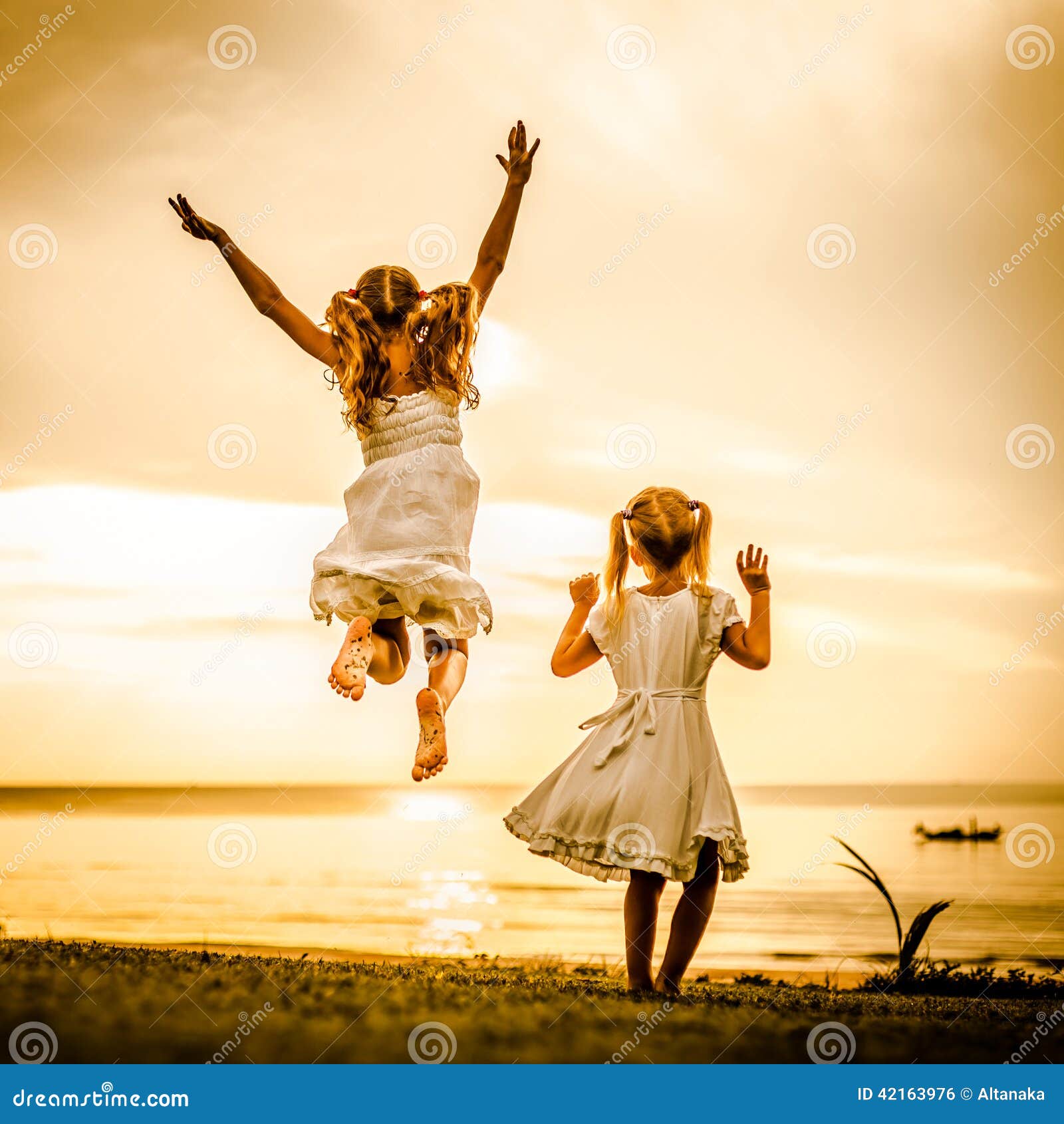 Happy Children Jumping on the Beach Stock Photo - Image of happy, girl ...