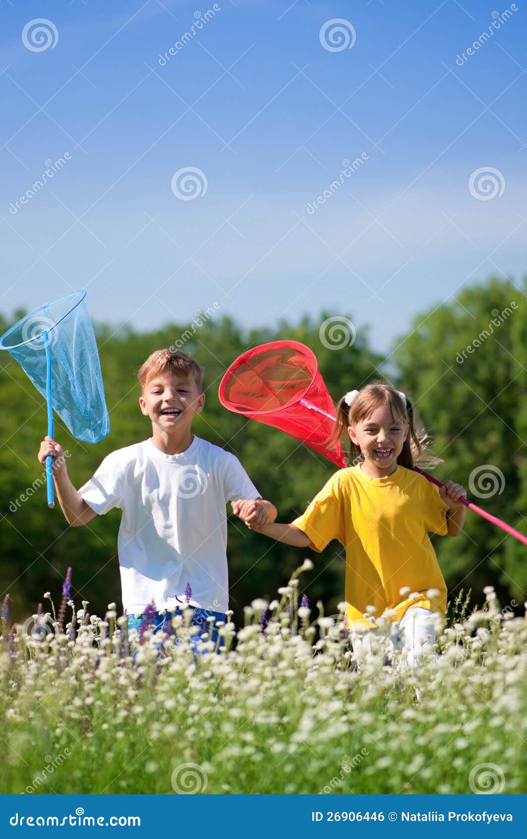 Happy children on meadow stock photo. Image of meadow - 26906446