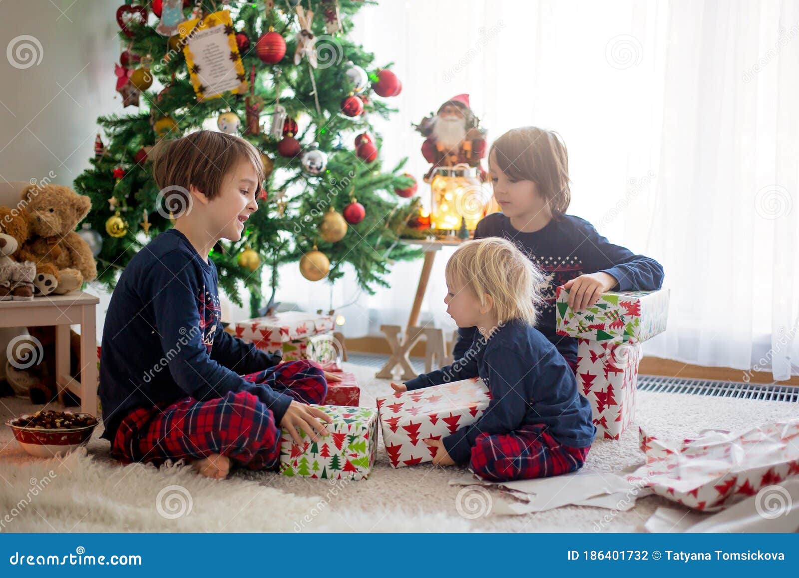 Happy Children, Opening Presents on Christmas Day Stock Photo - Image ... Happy Children, Opening Presents on Christmas Day Stock Photo - Image ...