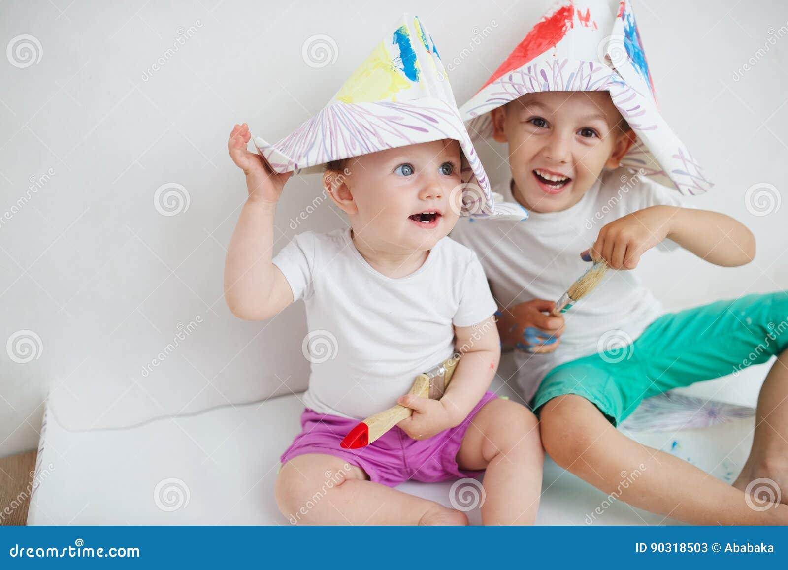 Happy Children Painting Wall at Home Stock Image - Image of colorful ...