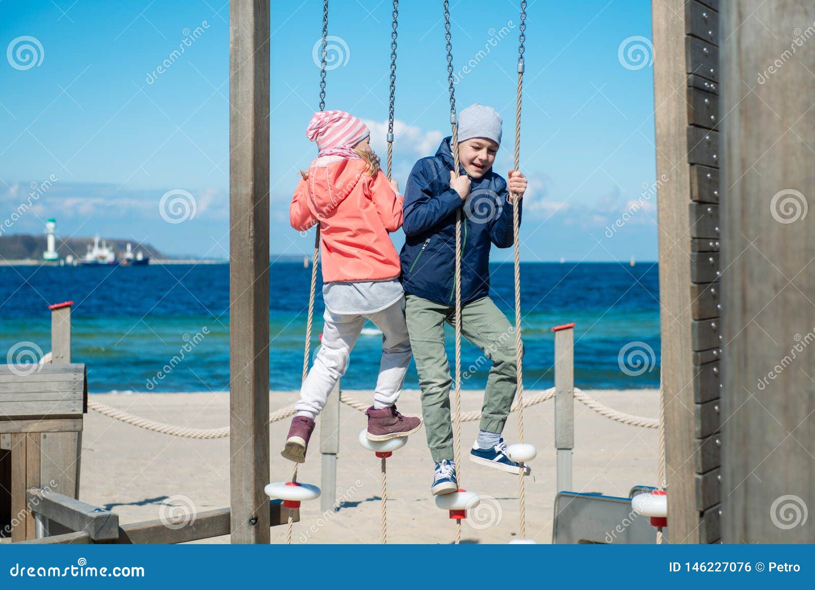 Happy Children Playing at Playground on a Beach Stock Photo - Image of ...