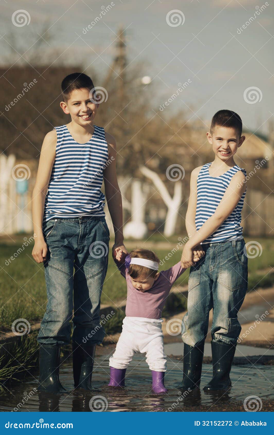Happy Children Playing in the Puddle Stock Photo - Image of childhood ...