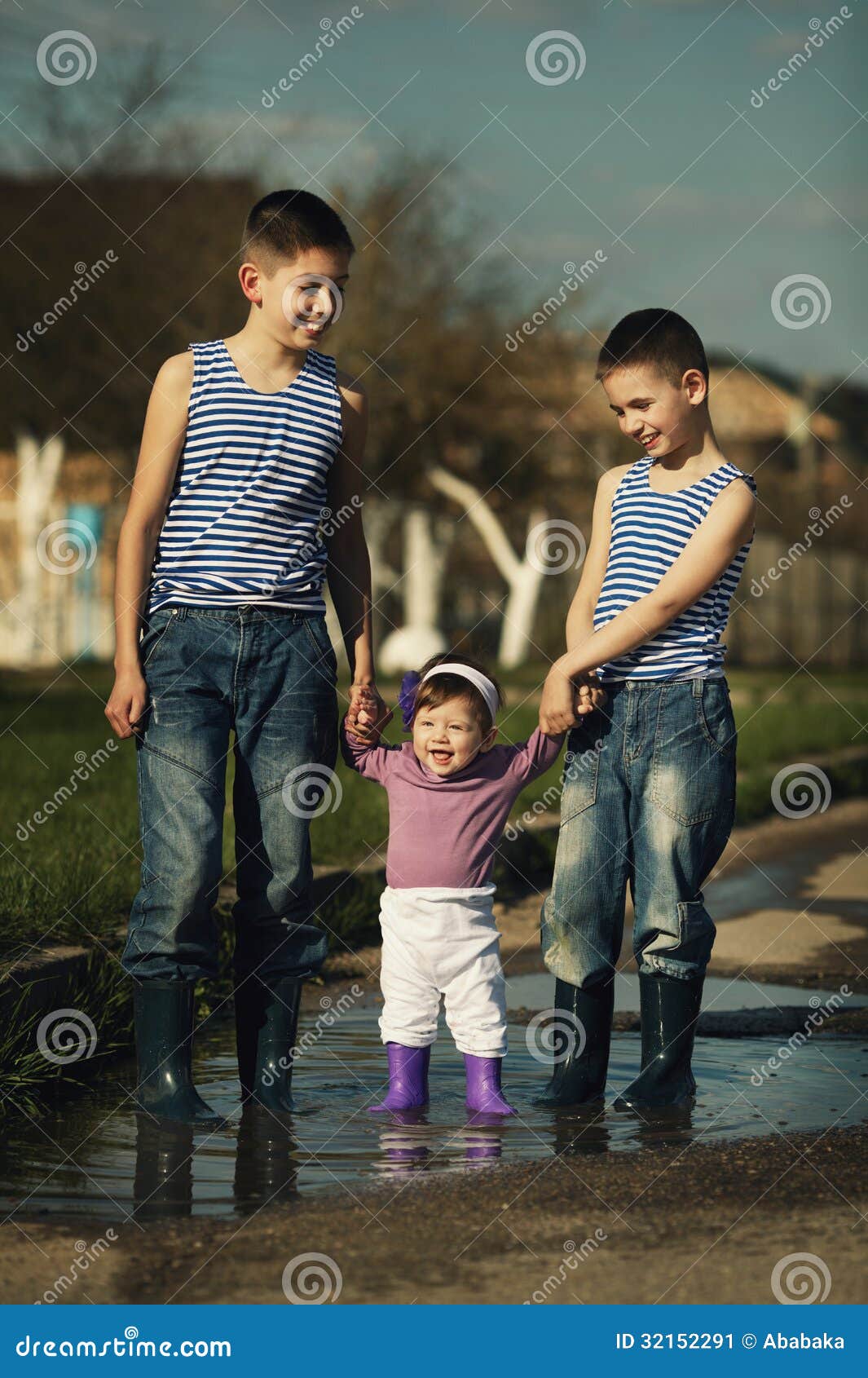 Happy Children Playing in the Puddle Stock Image - Image of people ...