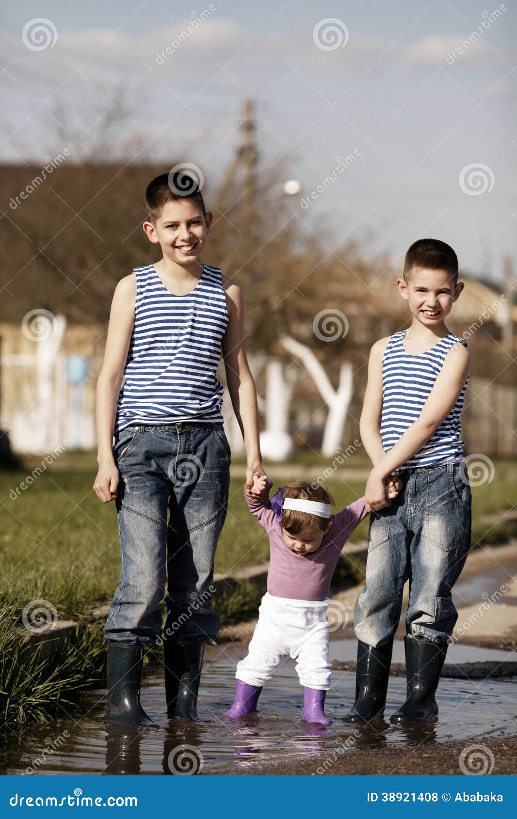 Happy Children Playing In The Puddle Stock Photography | CartoonDealer ...
