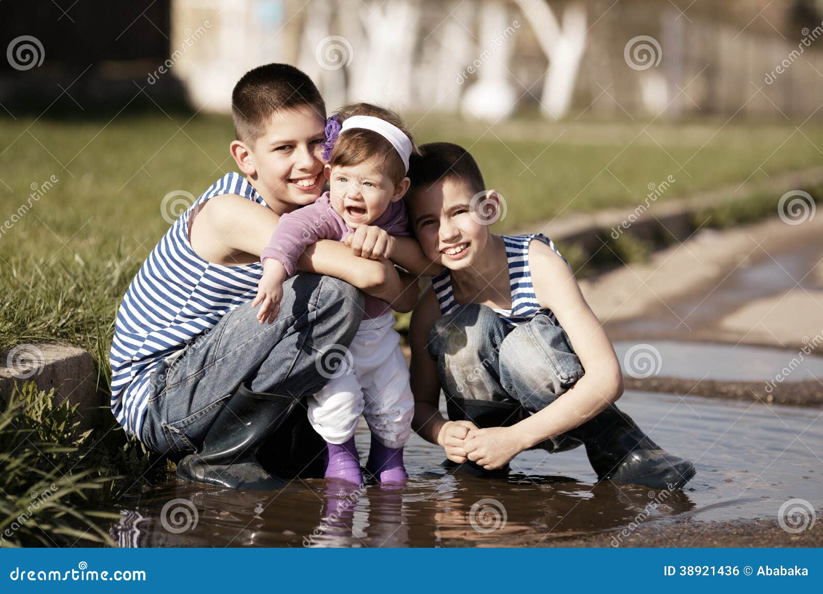 Happy Children Playing in the Puddle Stock Photo - Image of little ...