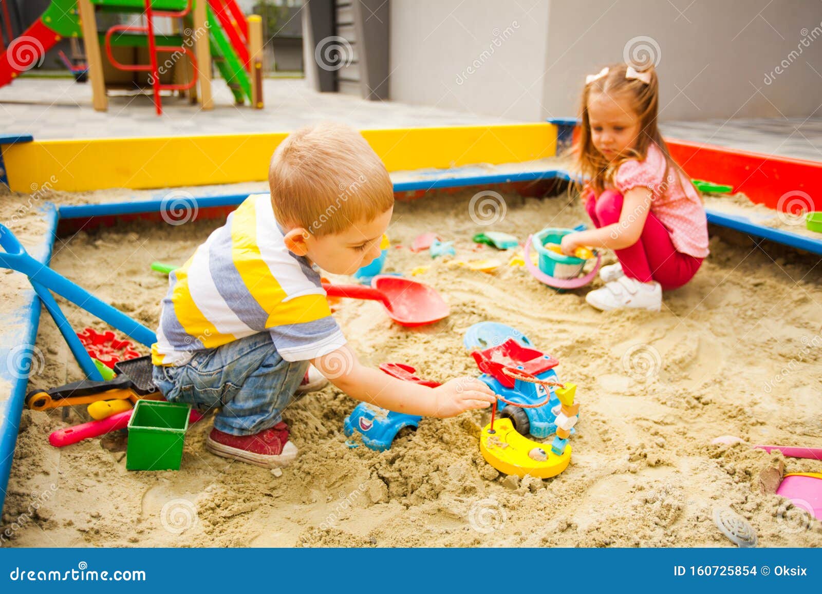 Happy Children Playing with Sand at Modern Playground Outside Stock ...