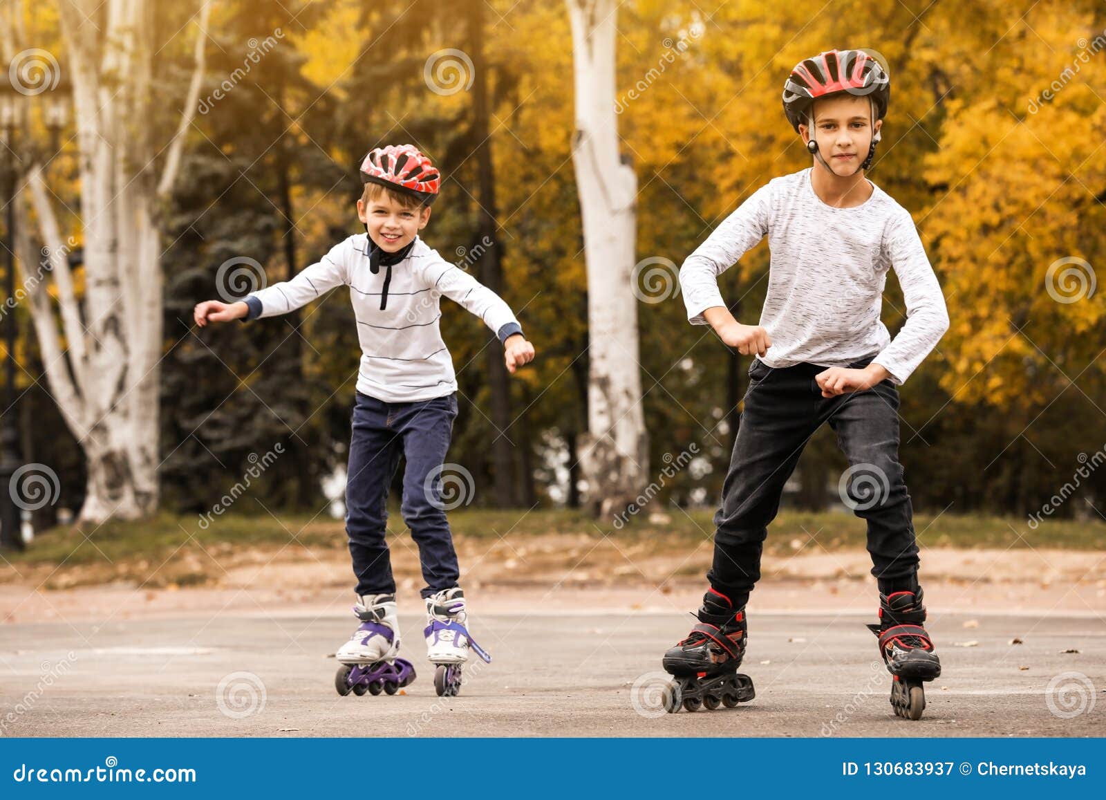 Happy Children Roller Skating Stock Image - Image of autumn, leisure ...