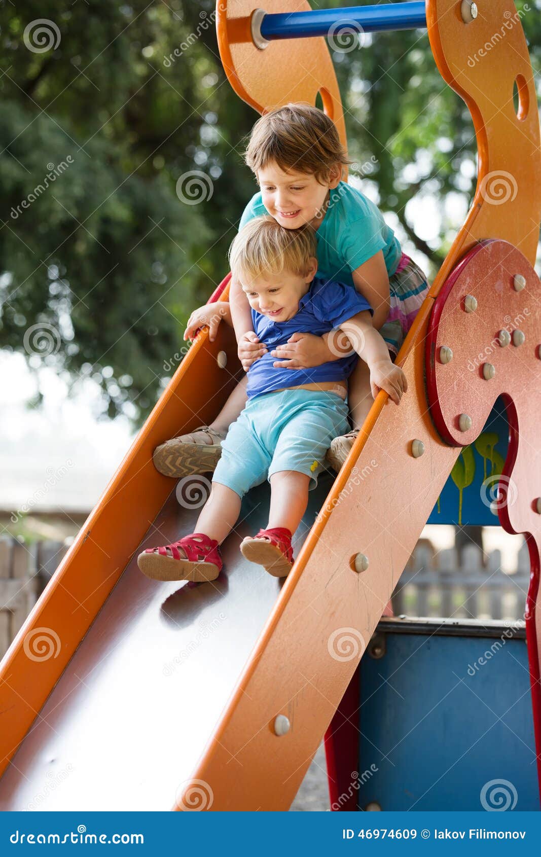 Happy Children On Slide Royalty-Free Stock Photo | CartoonDealer.com ...