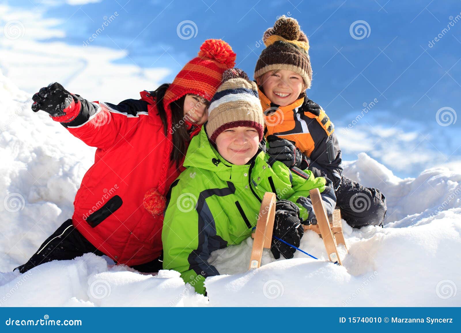 Happy children in snow stock photo. Image of brothers - 15740010