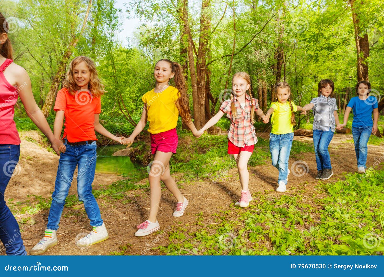 Happy Children Walking in the Forest Holding Hands Stock Photo - Image ...