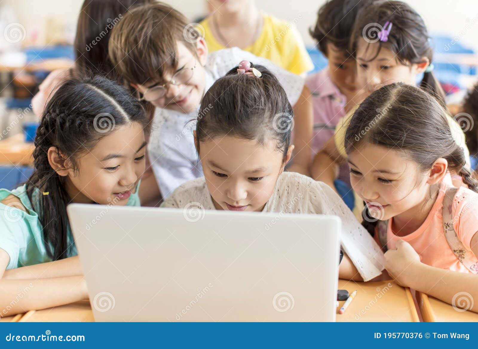 Happy Children Watching the Laptop in the Classroom Stock Photo - Image ...