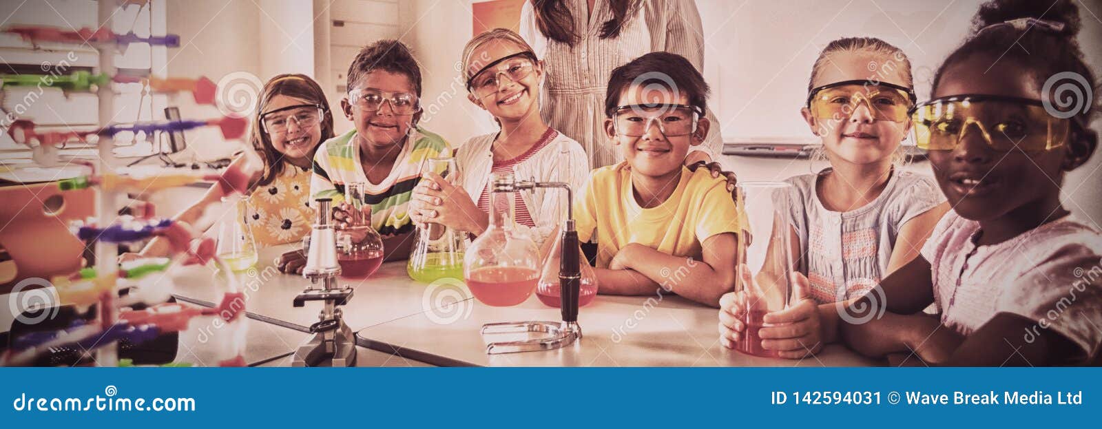 Happy Class Posing for the Camera Stock Image - Image of early, holding ...