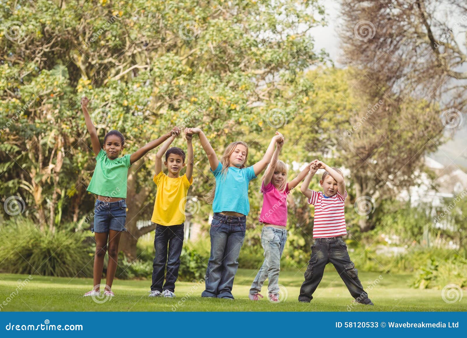 Happy Classmates Holding Hands Stock Image - Image of outdoors, five ...