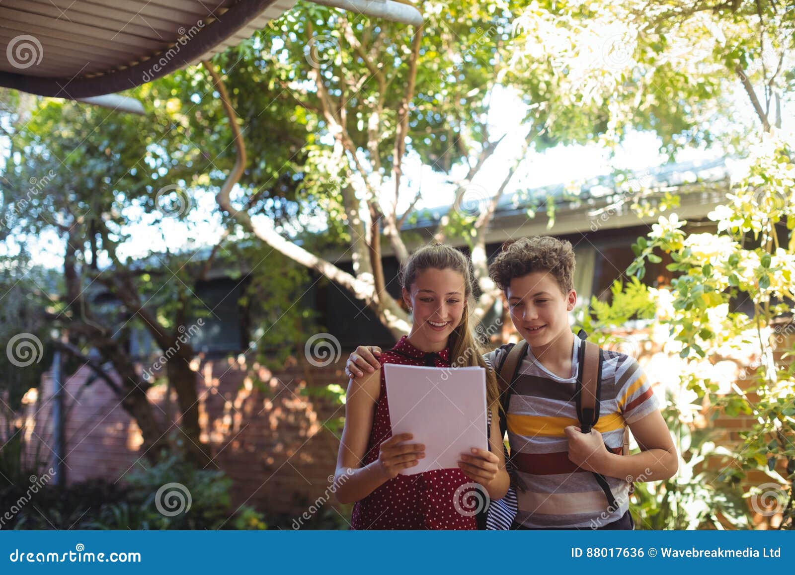 Happy Classmates Reading Book Stock Photo - Image of child, friendship ...