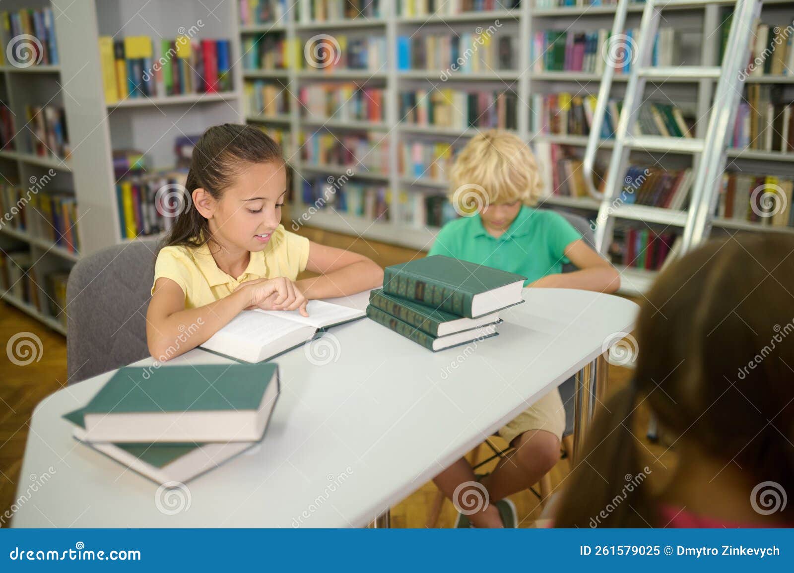 Happy Classmates Spending Time in the School Library Stock Image ...
