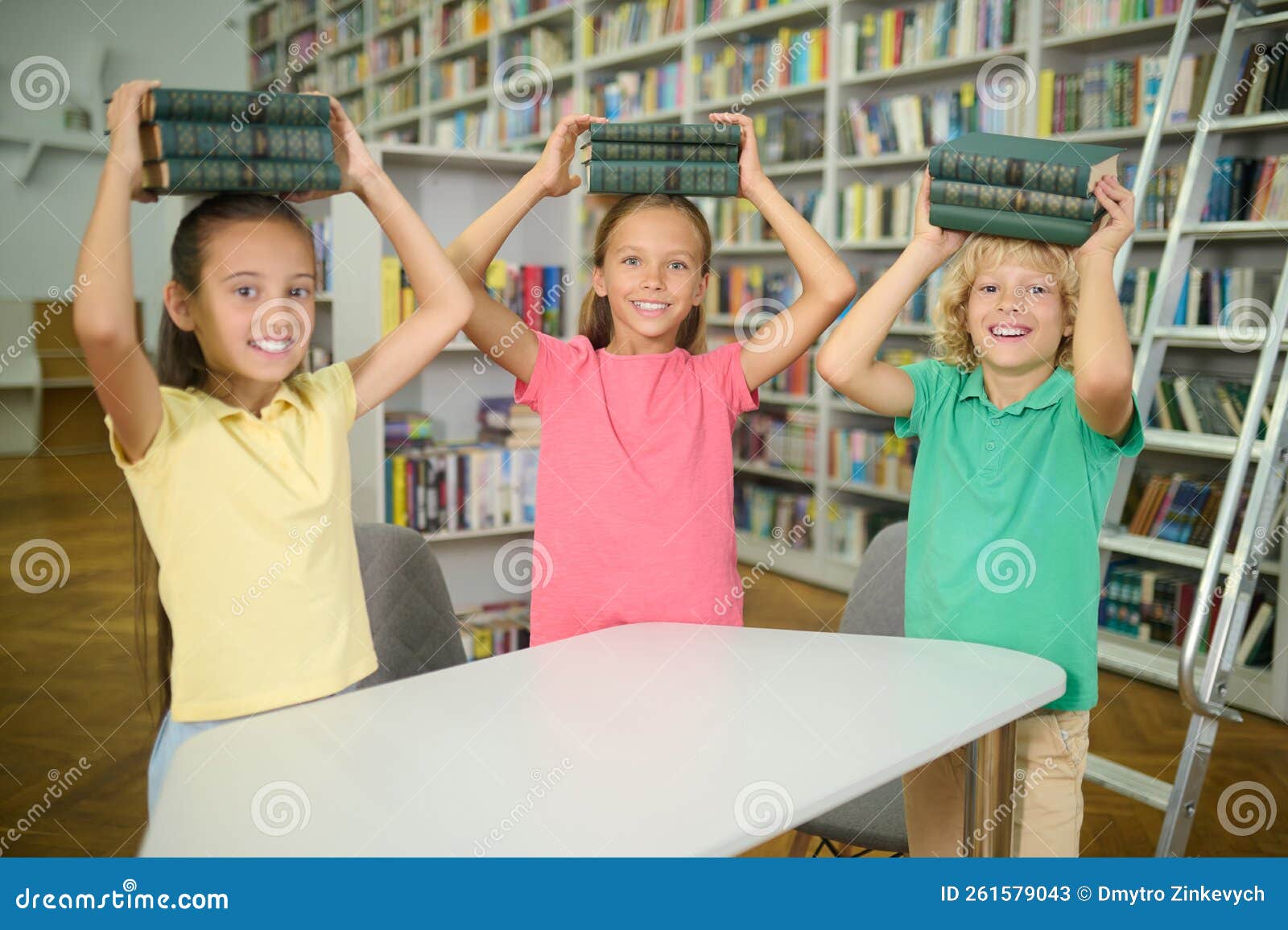 Happy Classmates Spending Time in the School Library Stock Image ...