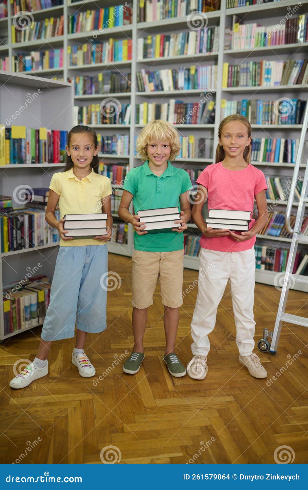 Happy Classmates Spending Time in the School Library Stock Photo ...
