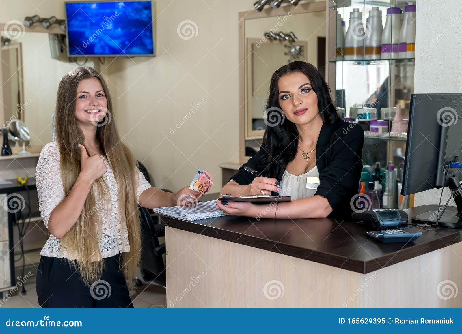 Happy Client with Administrator Near Reception Table Stock Image ...