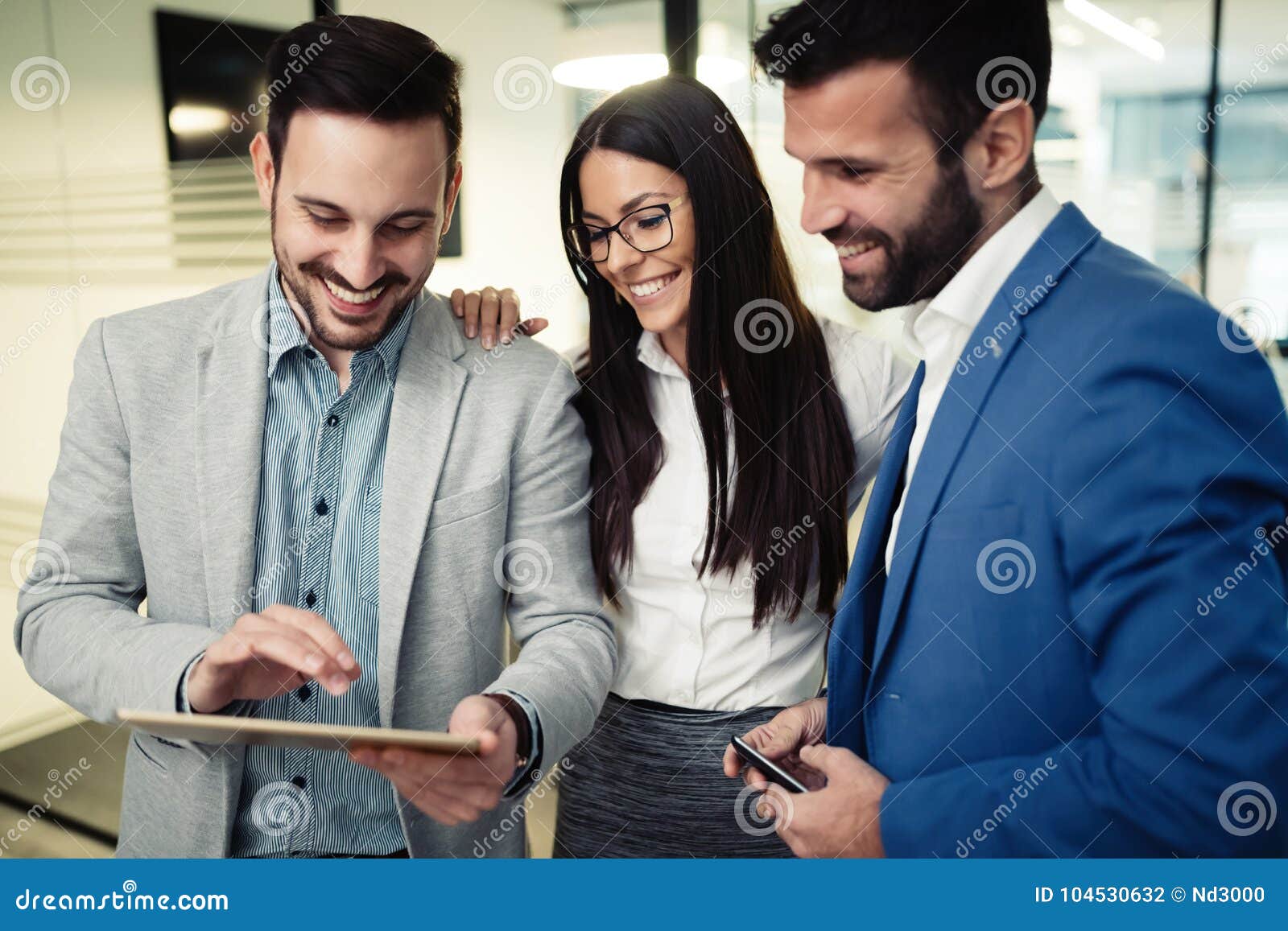Happy Colleagues Casual Chat at the Office Stock Photo - Image of ...