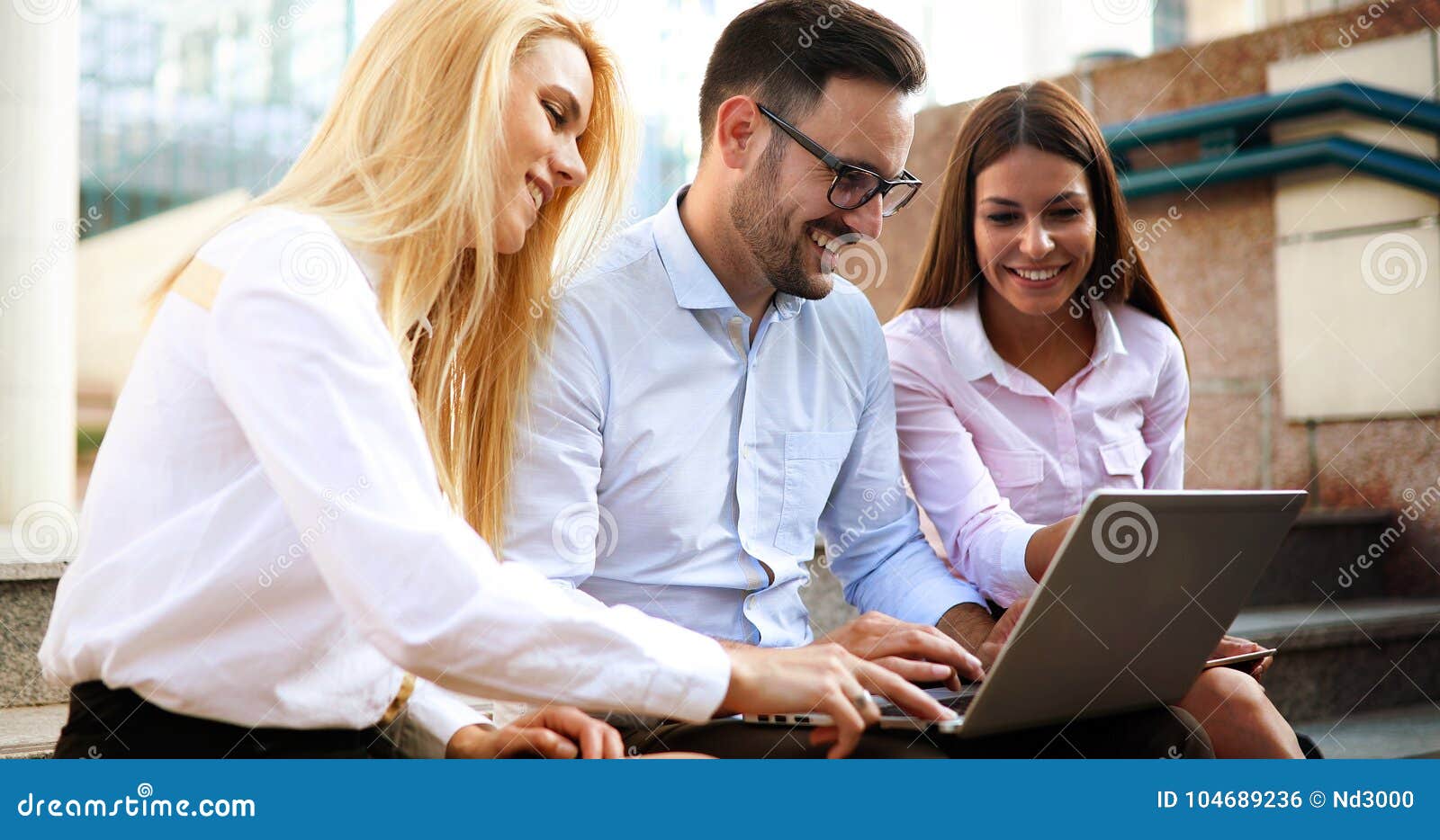 Happy Colleagues Casual Chat at the Office Stock Photo - Image of ...