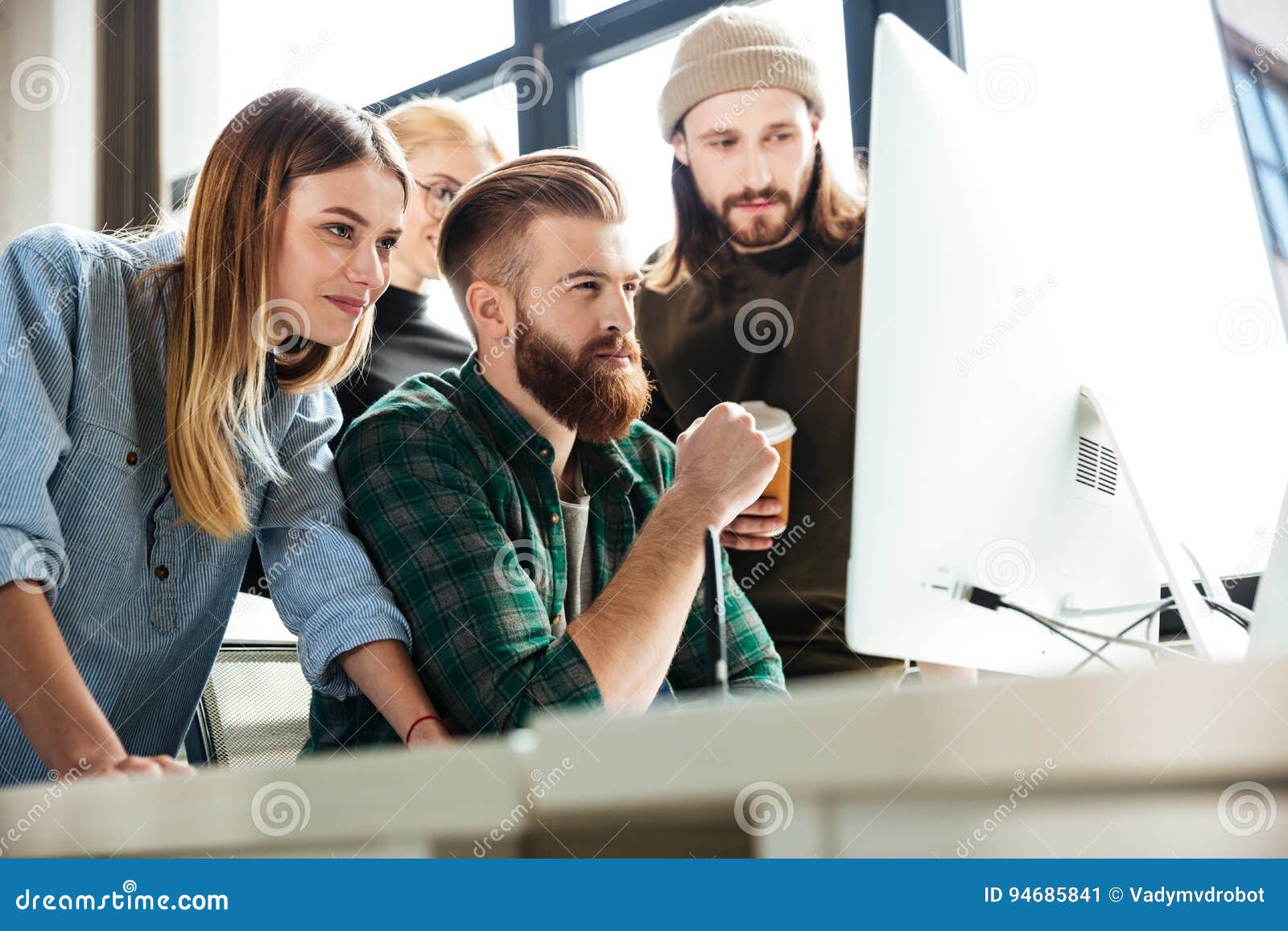 Happy Colleagues in Office Using Computer Stock Image - Image of ...