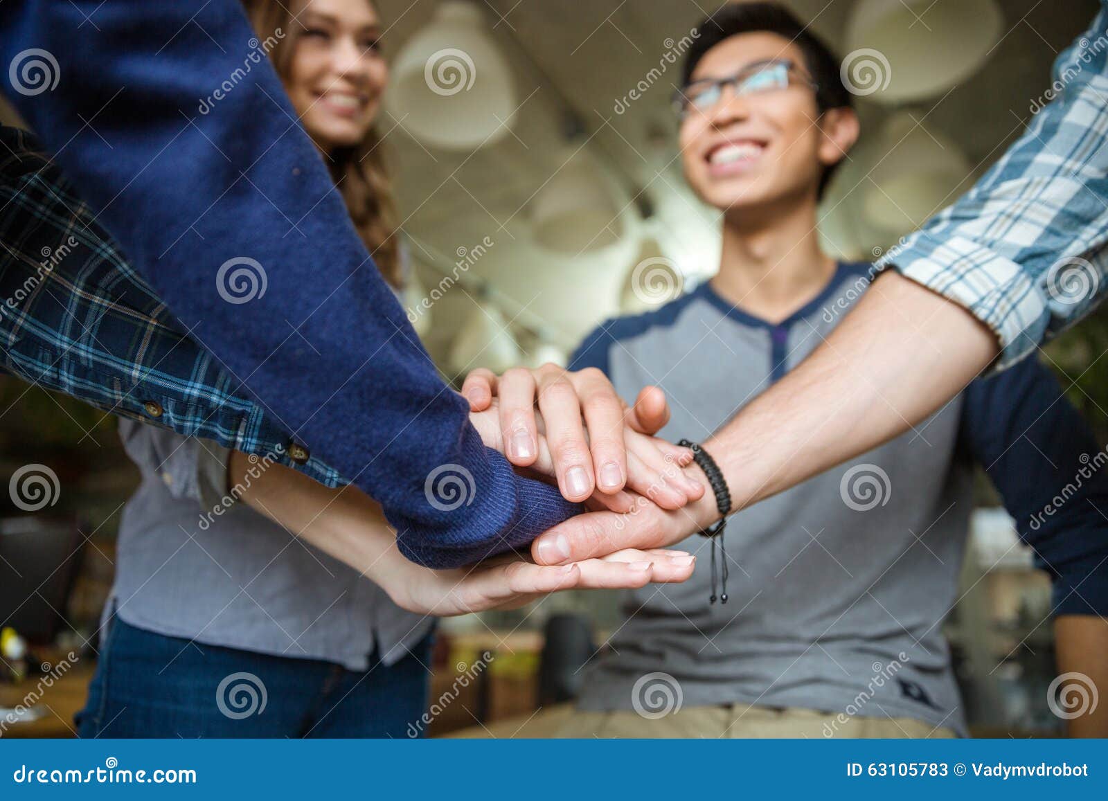 Happy Colleagues Put Hands on Top of Each Other Stock Image - Image of ...