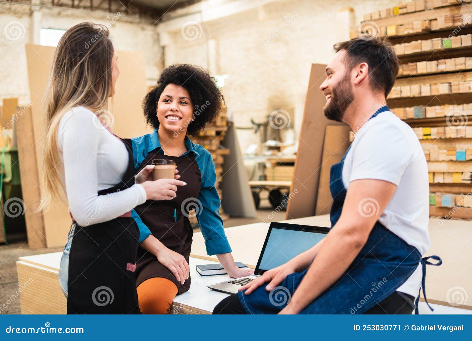 Happy Colleagues Smiling and Talking during Break at Warehouse Stock ...