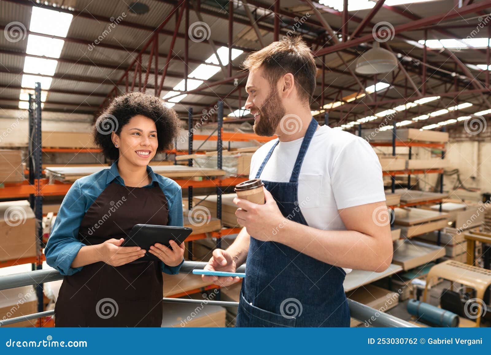 Happy Colleagues Talking during Break at Warehouse Stock Photo - Image ...