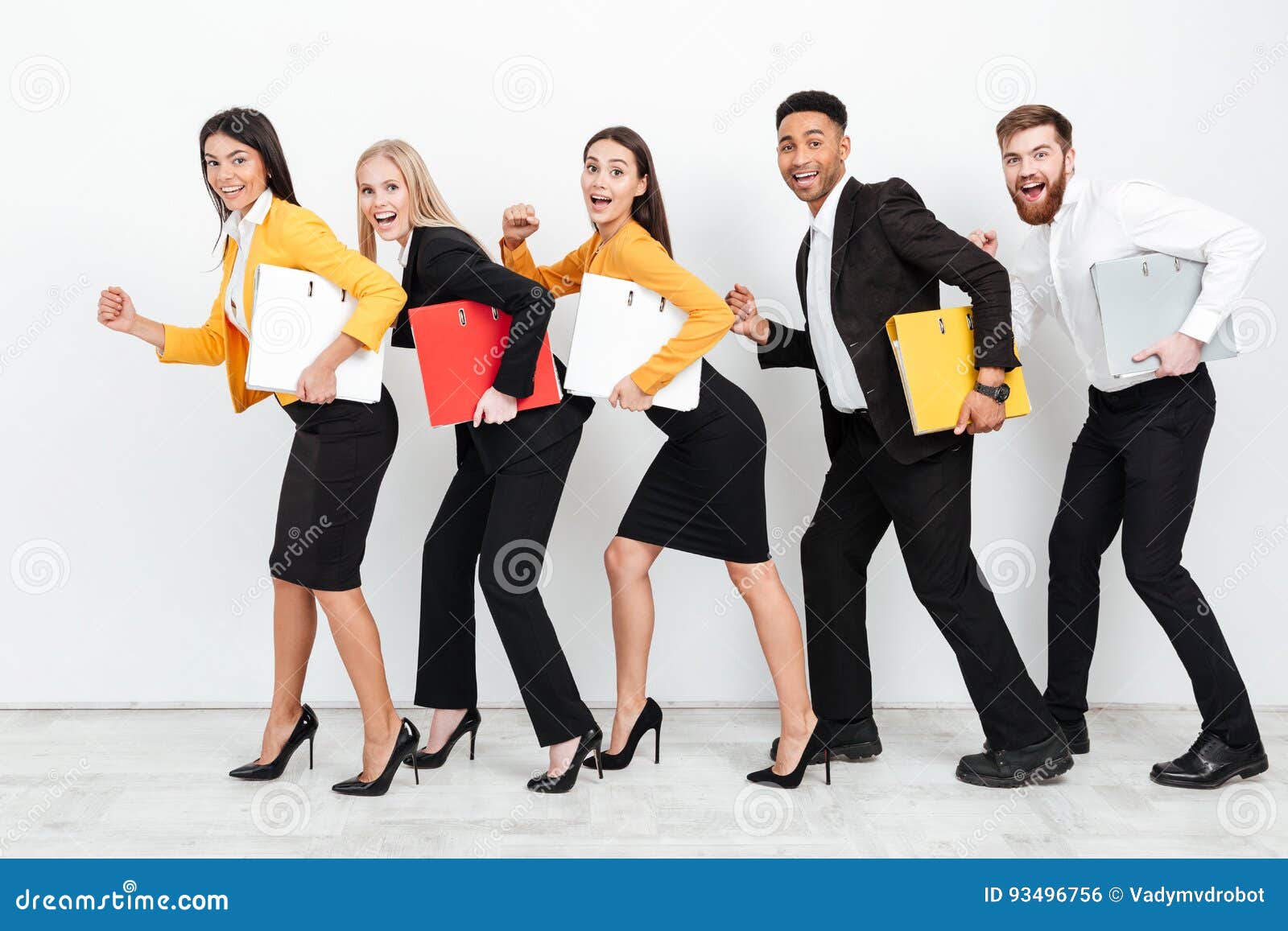 Happy Colleagues Walking Isolated with Folders in Office Stock Photo ...