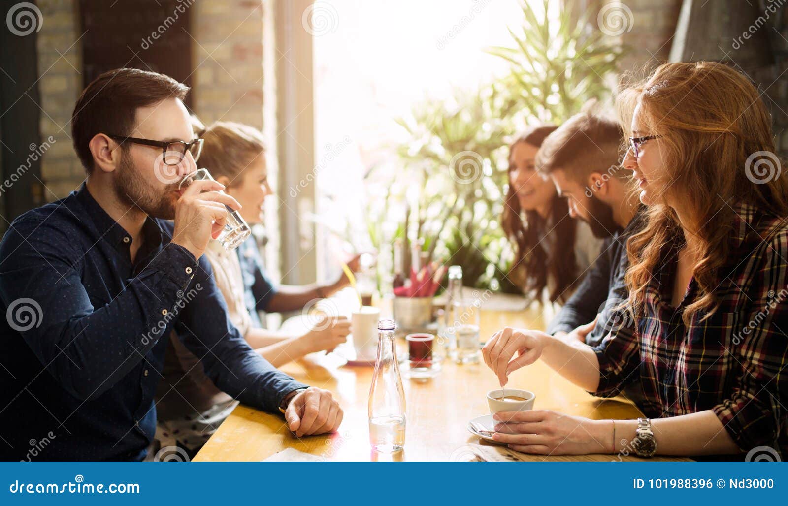 Happy Colleagues from Work Socializing in Restaurant Stock Photo ...