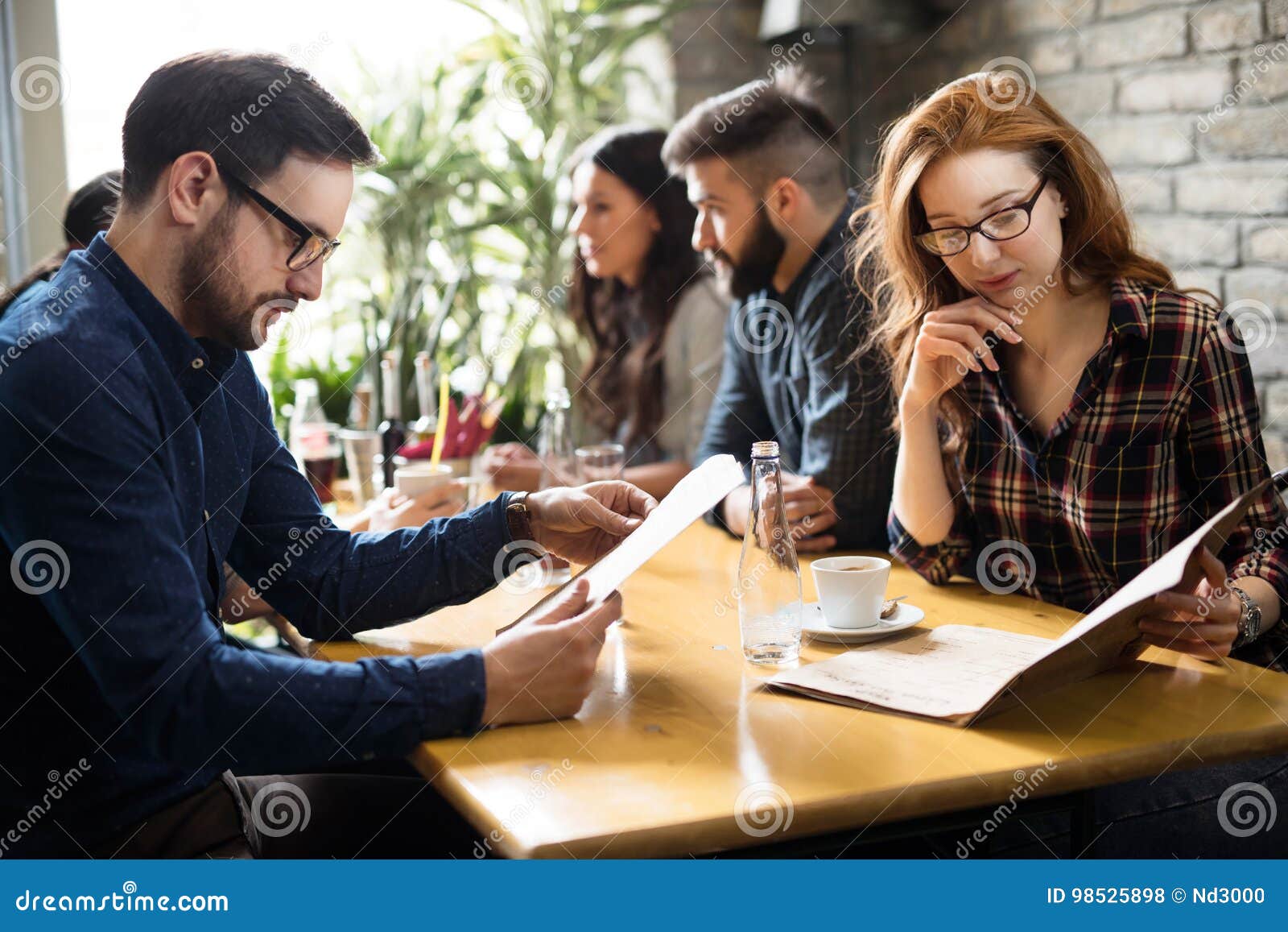 Happy Colleagues from Work Socializing in Restaurant Stock Photo ...