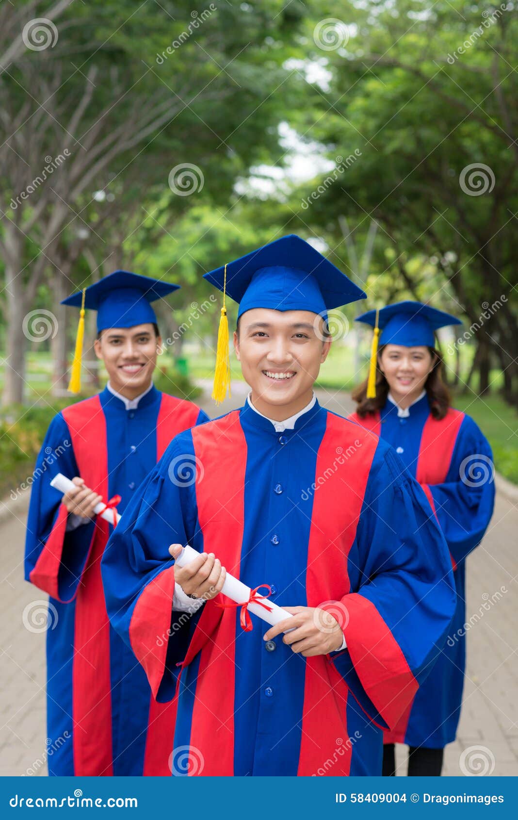 Happy college graduates stock photo. Image of diploma - 58409004