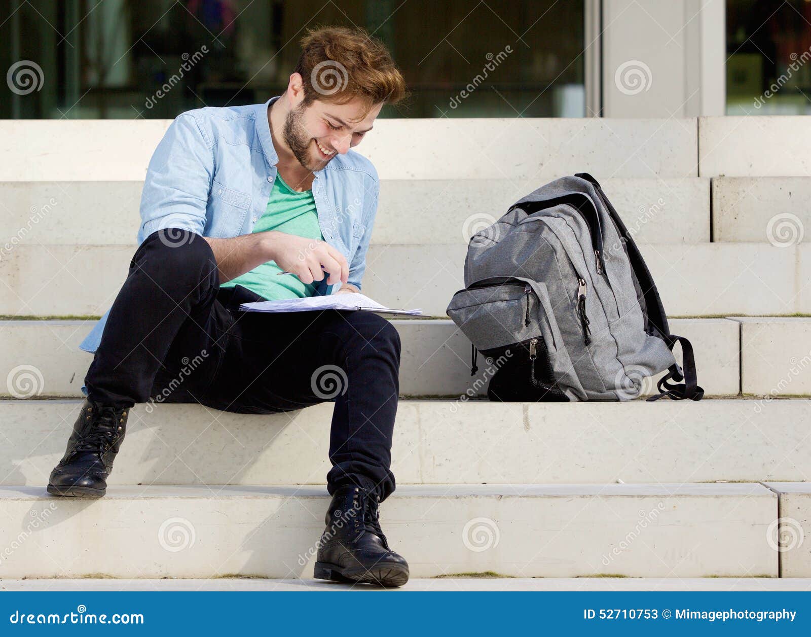 Happy College Student Sitting Outside on Campus Stock Image - Image of ...