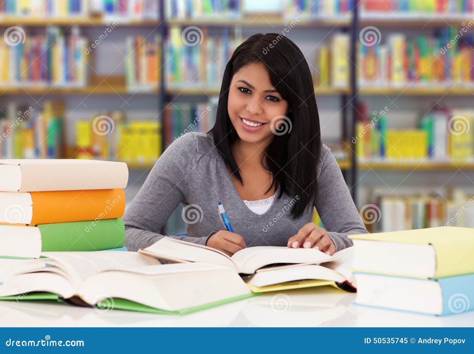 Happy College Student Studying in Library Stock Image - Image of ...