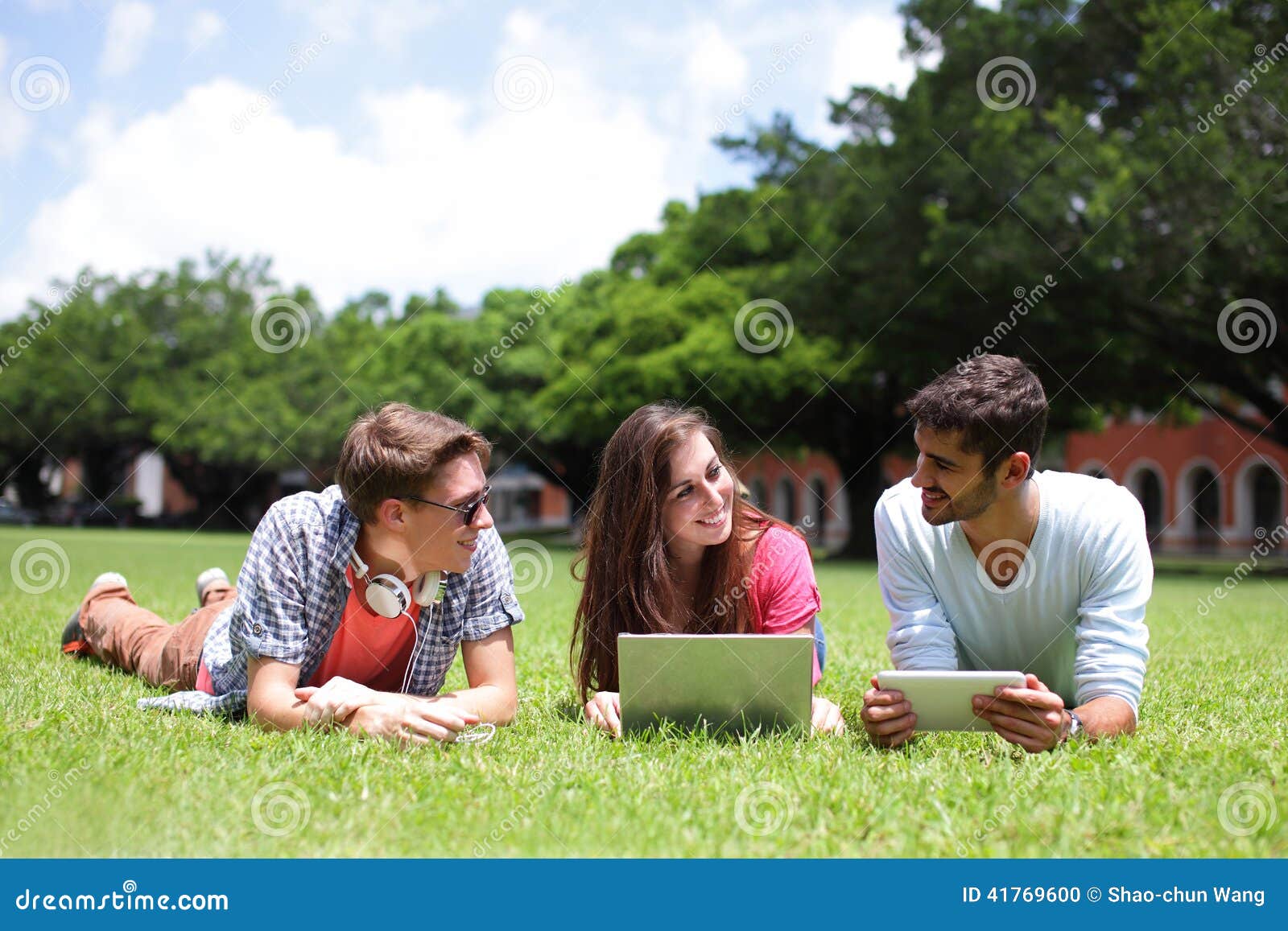 Happy College Students Using Computer Stock Photo - Image of campus ...