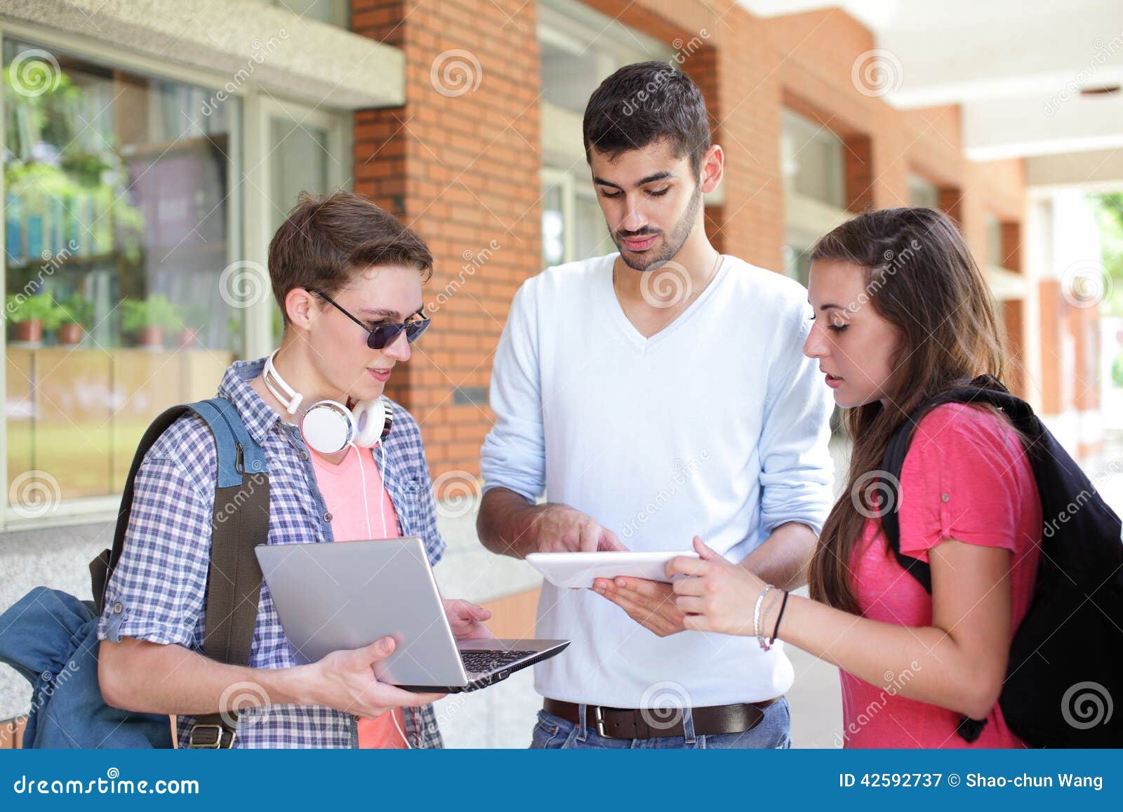 Happy College Students Using Computer Stock Image - Image of casual ...